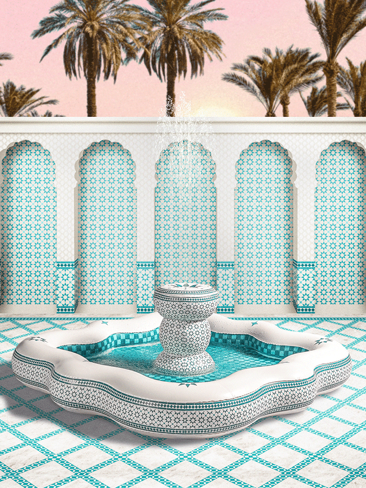 The Next Best Thing to a Pool Is This $55 Blow-Up Water Fountain