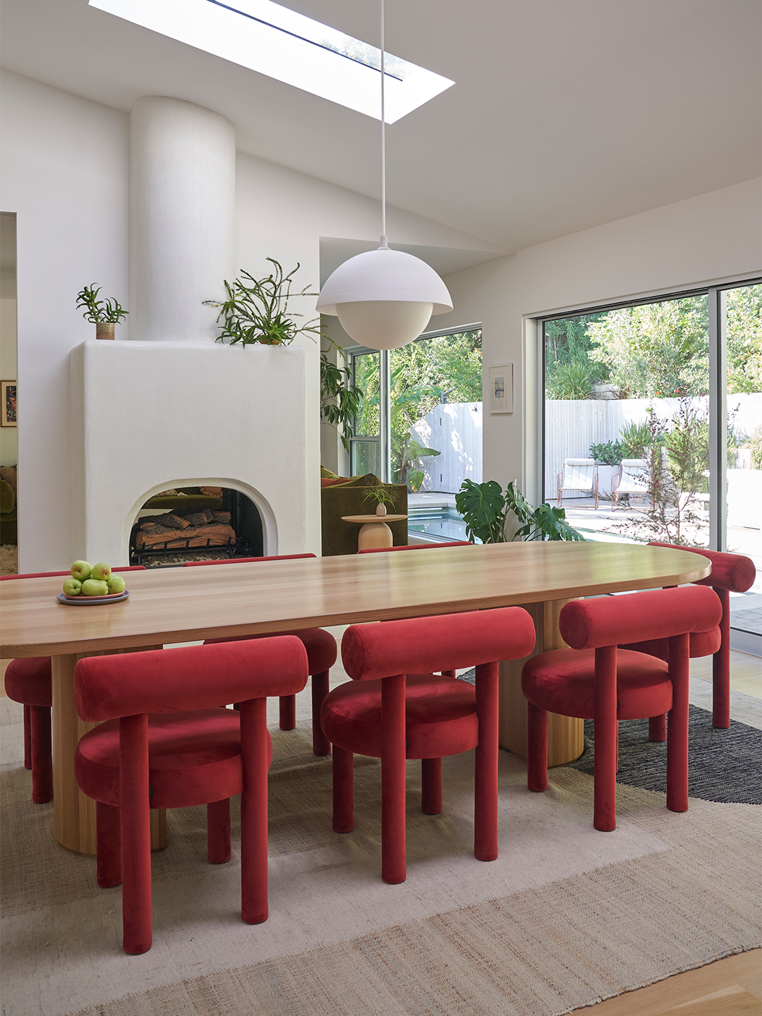 A Sunken Dining Room and Double-Sided Fireplace Bring Openness to This ...