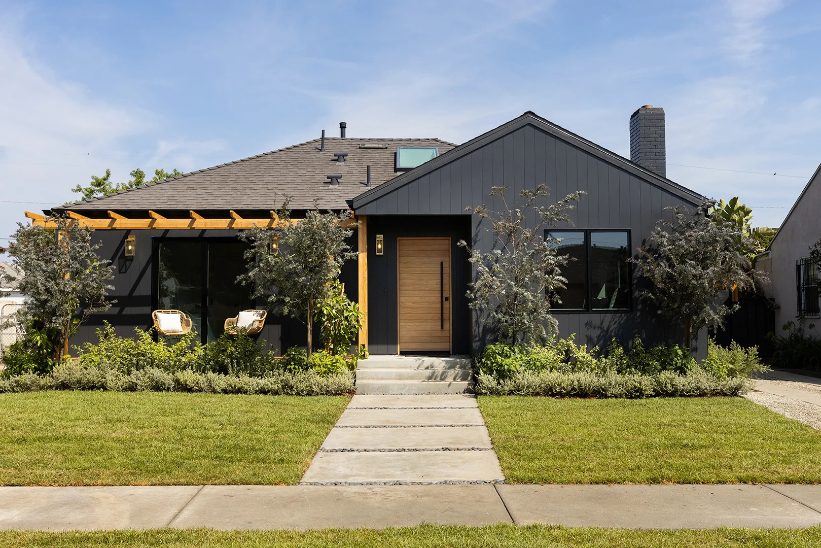 10 Black Exterior Houses That Put the Drama Front and Center | domino
