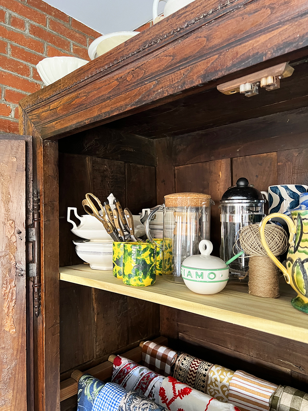 How a Stylist Retrofit an Antique Cabinet to Be His Prop Closet