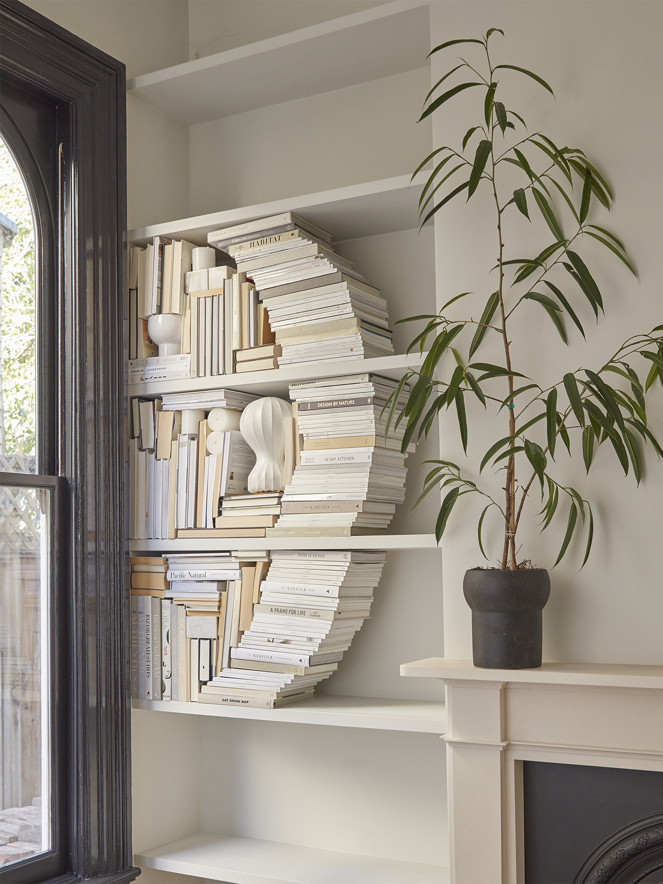 This Bookcase Styling Idea Creates Art Out of Magazines