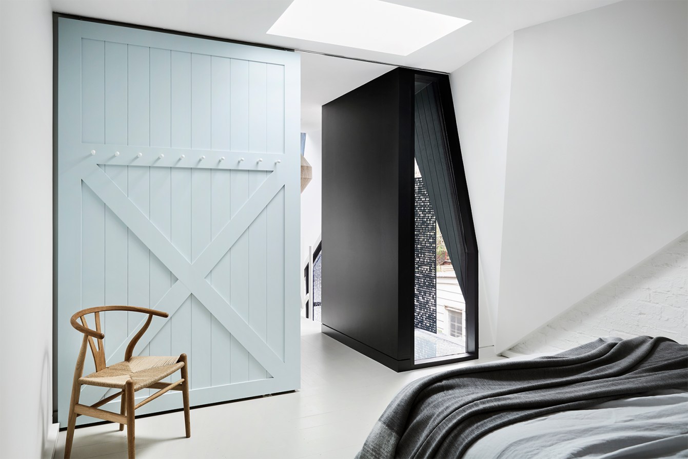 6 Modern Interior Barn Doors That Are So Much More Than Farmhouse VIbes