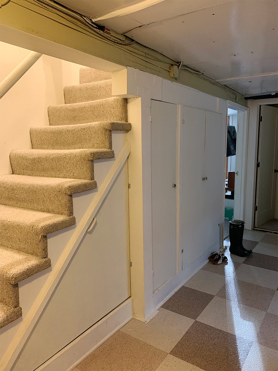 A Cozy Hideout Awaits Underneath This Now-Finished Basement’s Steps