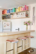 The Kitchen Doubles as a Library in This Apartment Full of Small Space ...