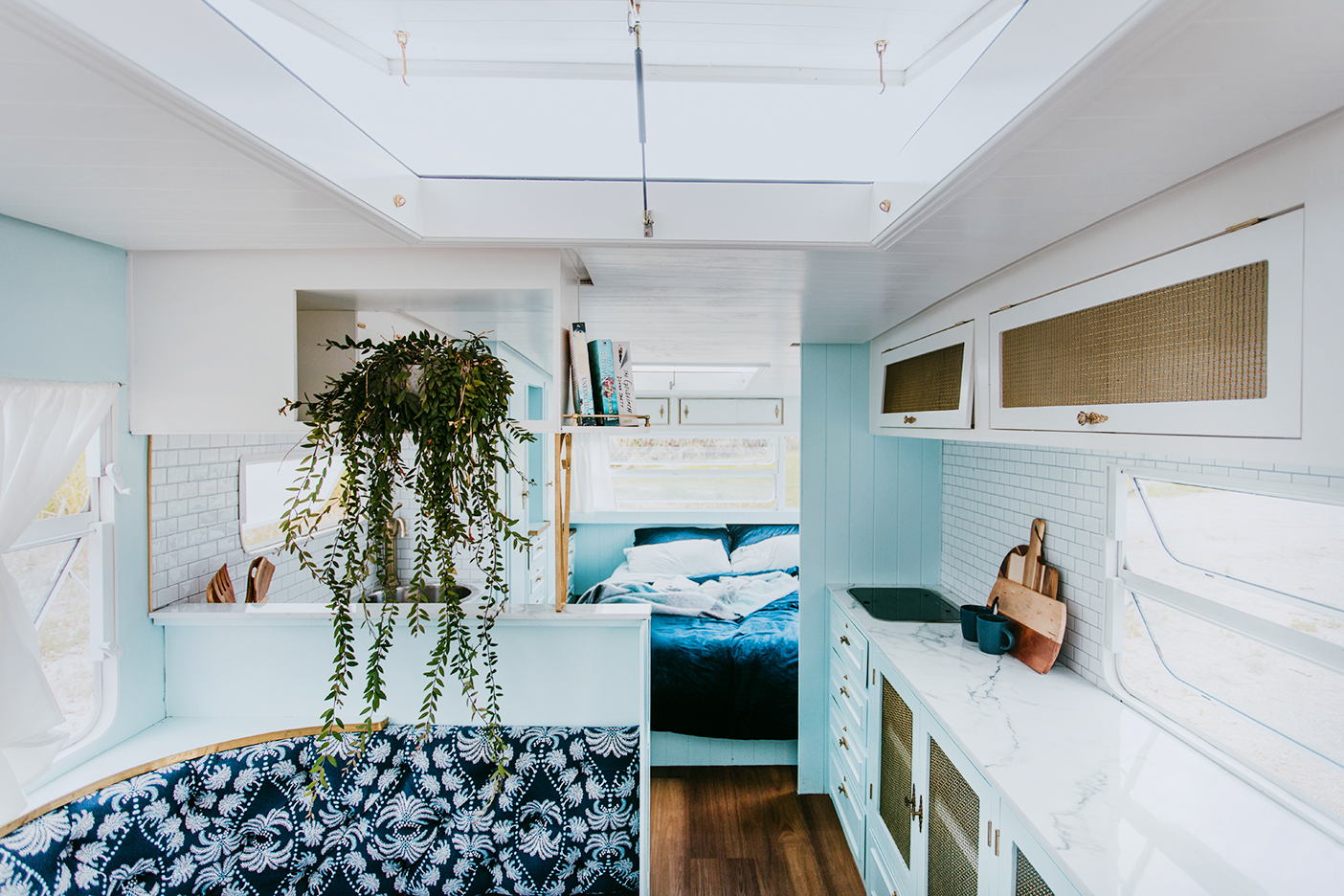 This Renovated Caravan Miraculously Squeezes a Queen-Size Bed and Bunks