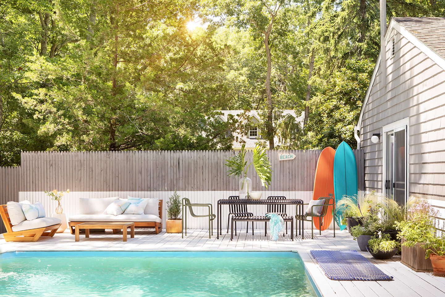 A Few Gallons of Paint Transformed this Backyard Into a Chic Summer Hangout