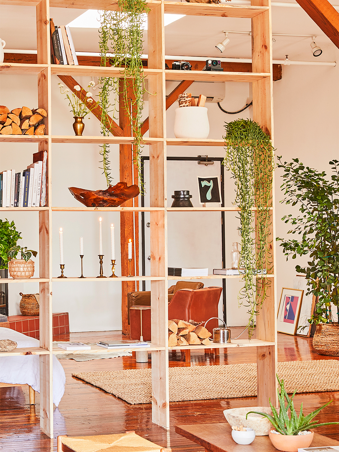 This Seasoned Stylist Built a 12-by-8 Foot Bookshelf in Her Loft That ...