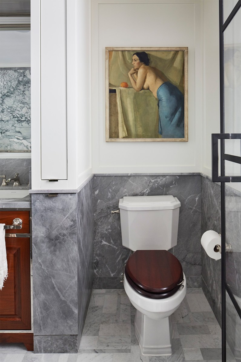 Turquoise Marble Takes on the Look of Wood Paneling in This NYC Bathroom