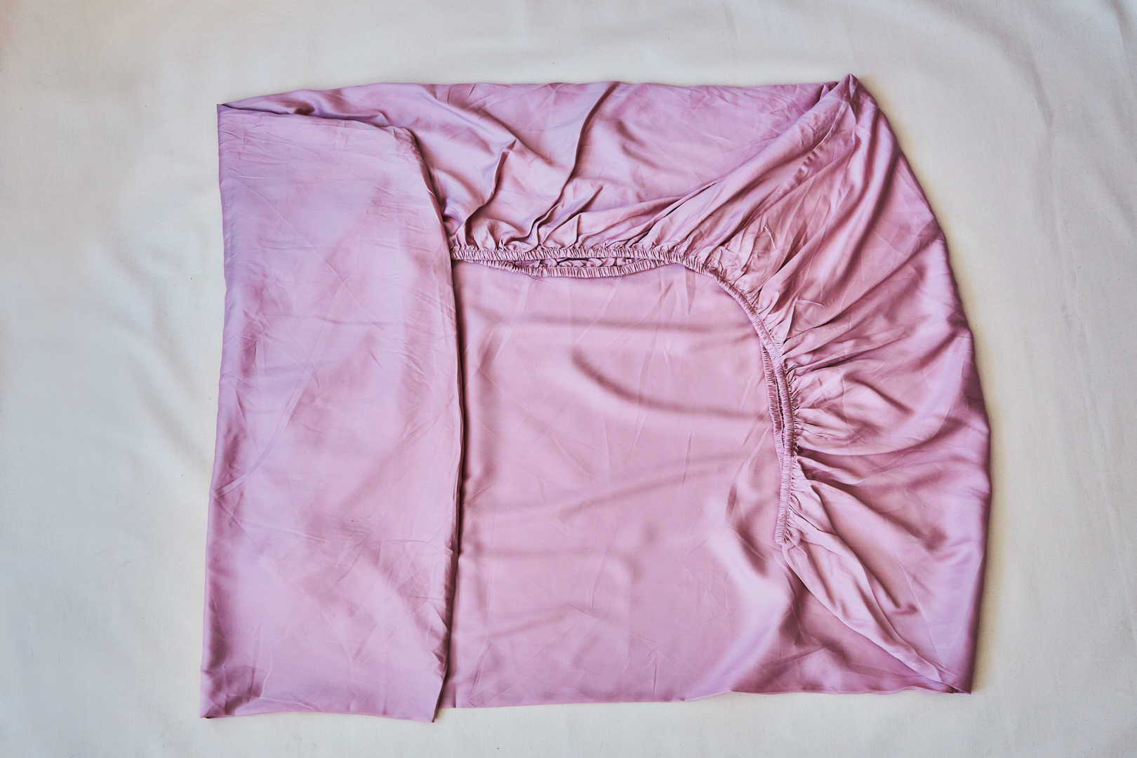 How to Fold a Fitted Sheet So It Actually Stacks Neatly