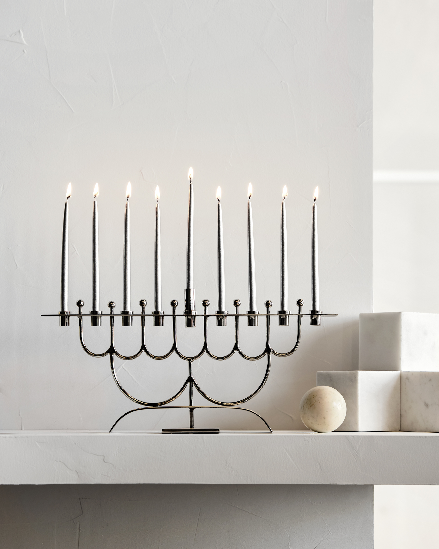 Crate & Barrel's Lucia Eames Collection Brings a Vintage Menorah to Life