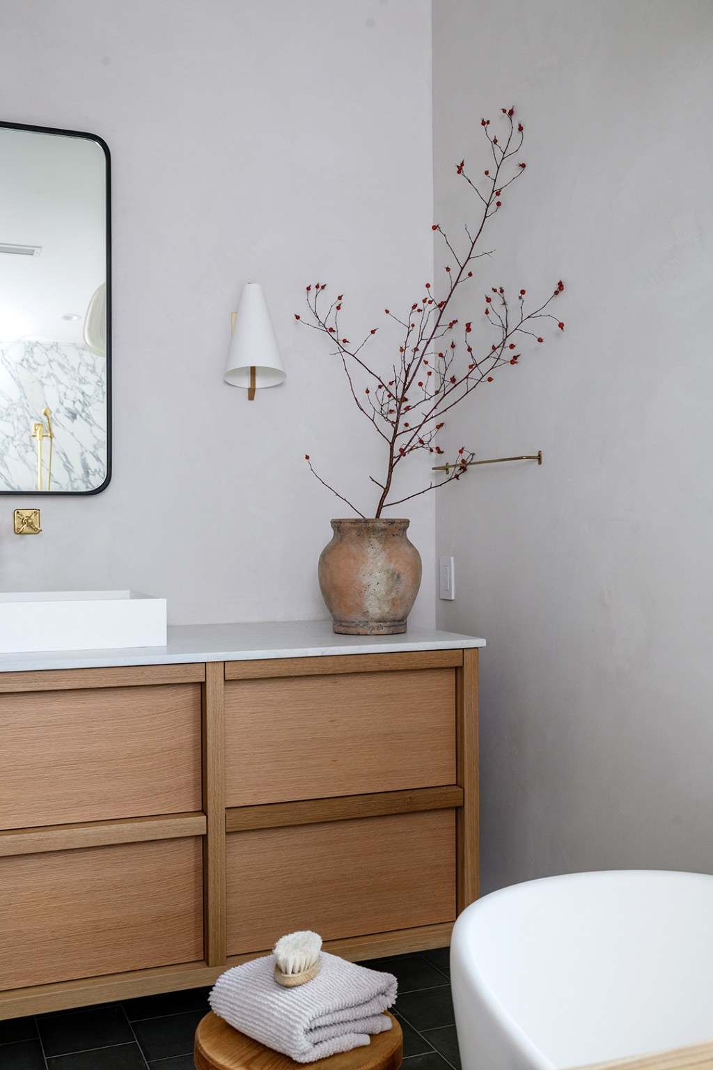 All the Bathrooms in This Mountain Retreat Have Oak Vanities, But That’s Where the Similarities ...