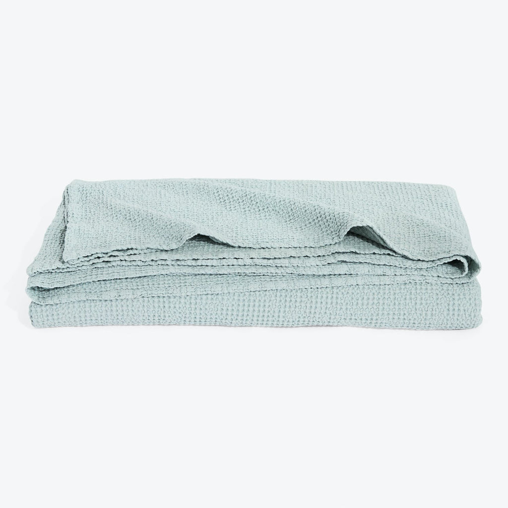 10 Lightweight Throw Blankets To Layer On Your Bed This Summer | domino