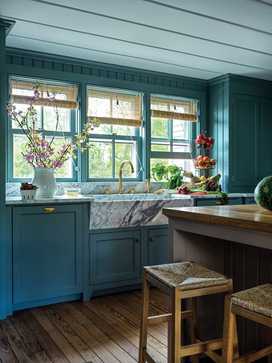 How These Designers Prevented Their Dark Blue Kitchen from Feeling Too Cold