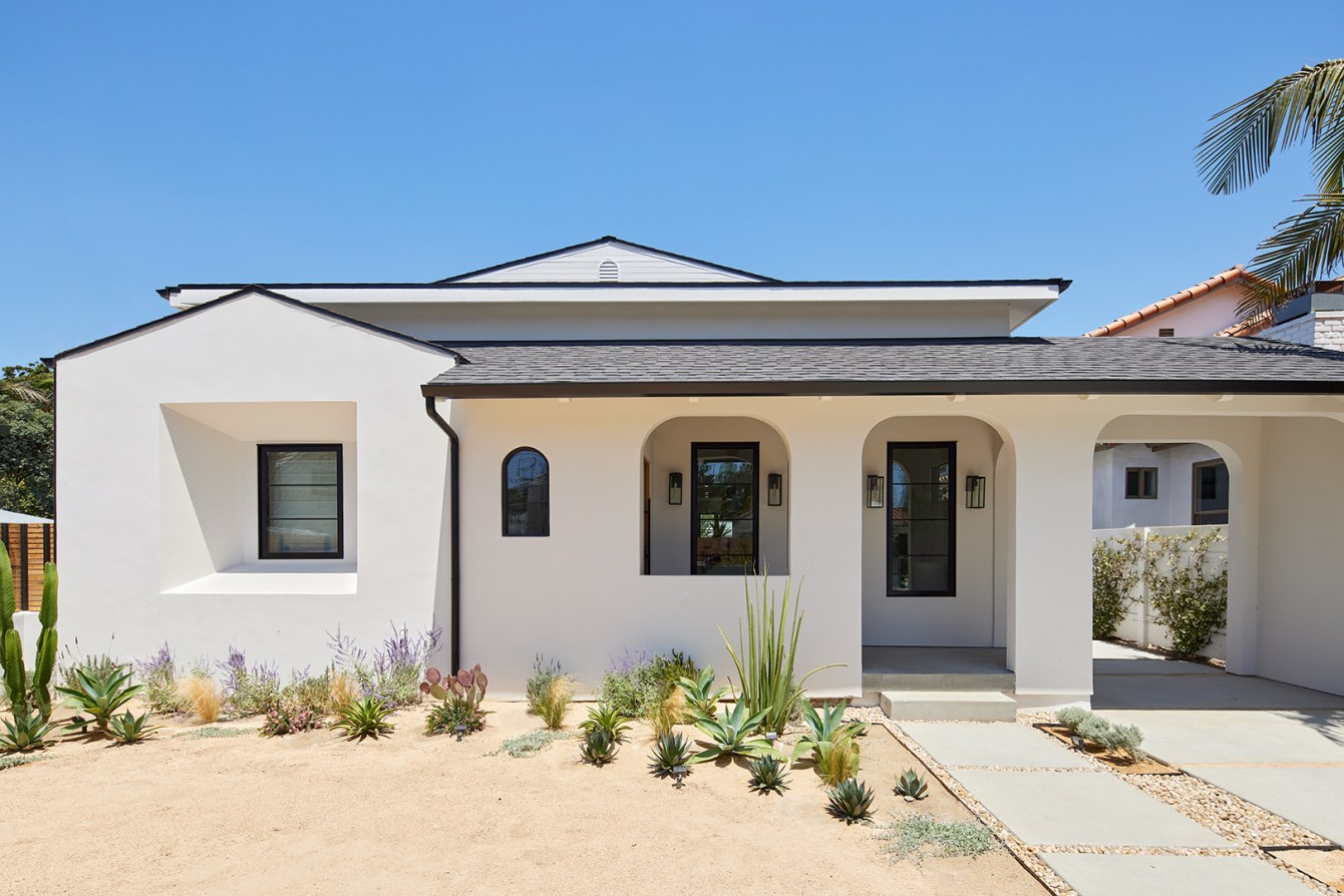 Everything in This Home’s ADU Can Be Hidden Within a Wall of Cabinets