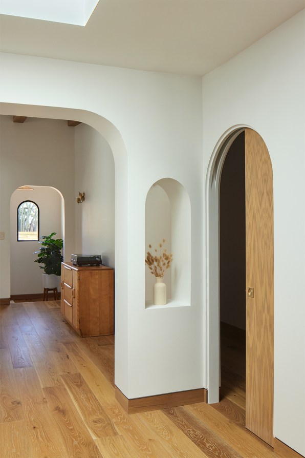 Everything in This Home’s ADU Can Be Hidden Within a Wall of Cabinets