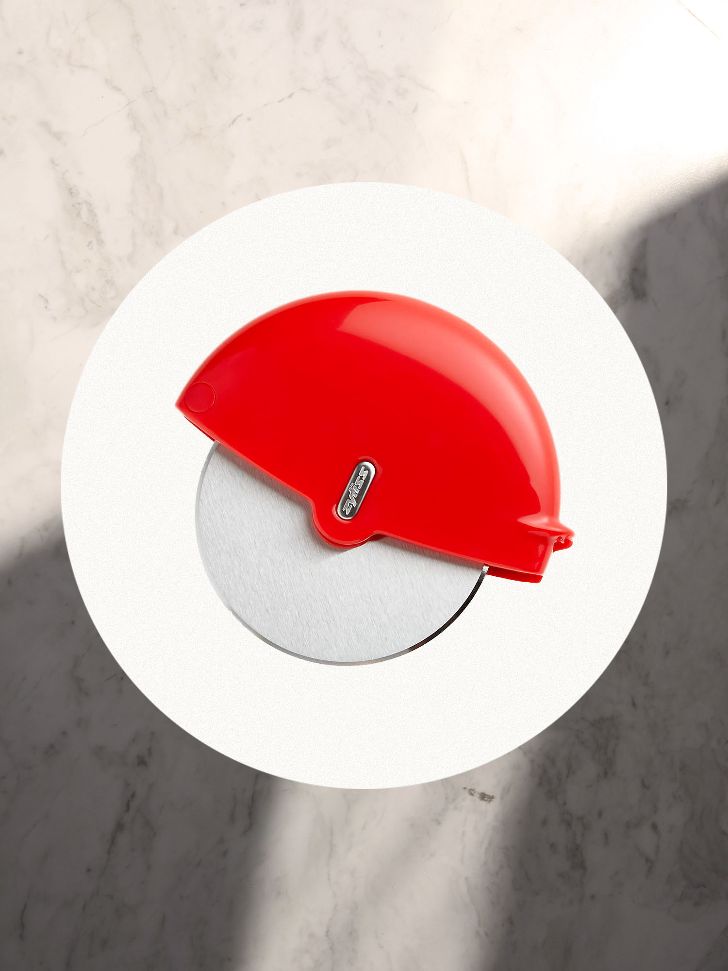 This Swiss Pizza Cutter is on Sale for $13 at Crate & Barrel | domino