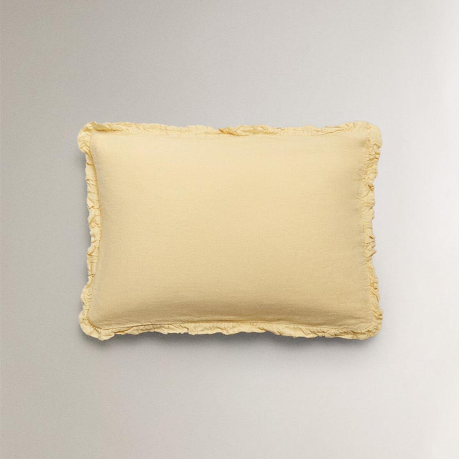 10 Best Ruffle Pillows to Add a Sweet Touch to Your Sofa | domino