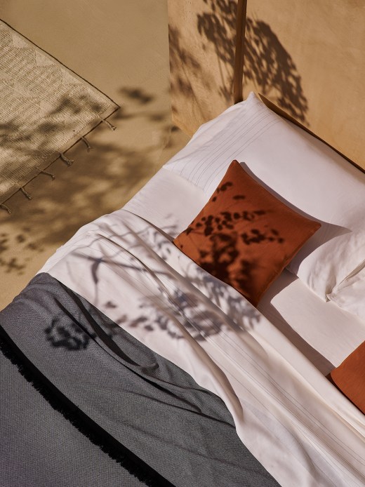 These Sheets Show Up Over and Over in Our Favorite Hotel Rooms