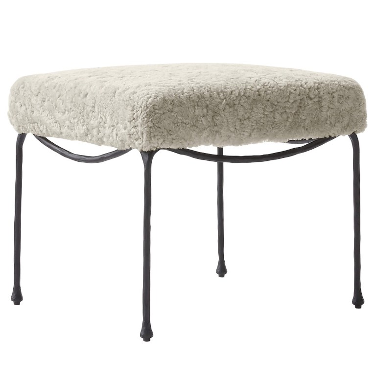 We Keep Spotting This Antique-Looking CB2 Stool in Designer Projects