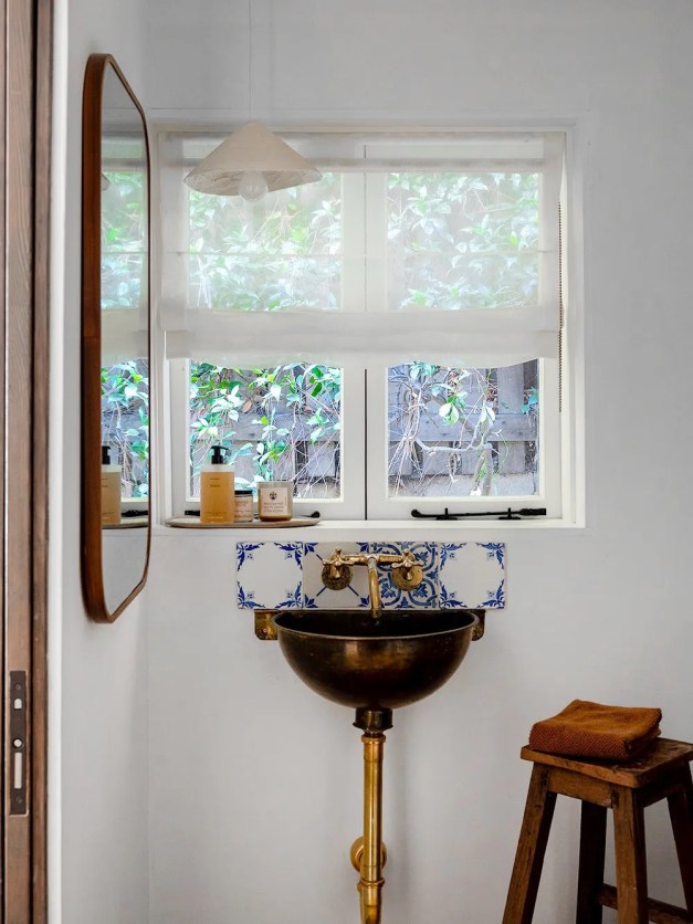 8 Bathroom Mirror Ideas for When There’s a Window in Your Way