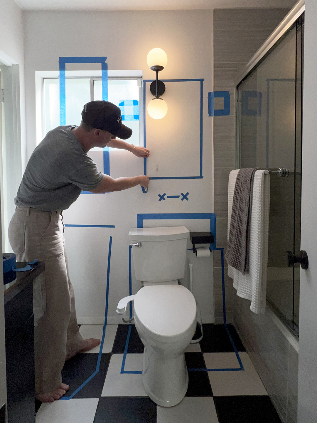 A Tiny Bathroom Gets a Makeover with a Nightstand Doubling as a Vanity